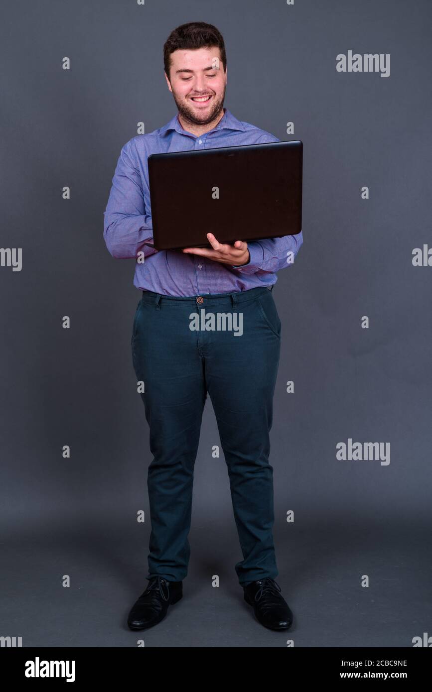 Fat guy at computer hi-res stock photography and images - Alamy