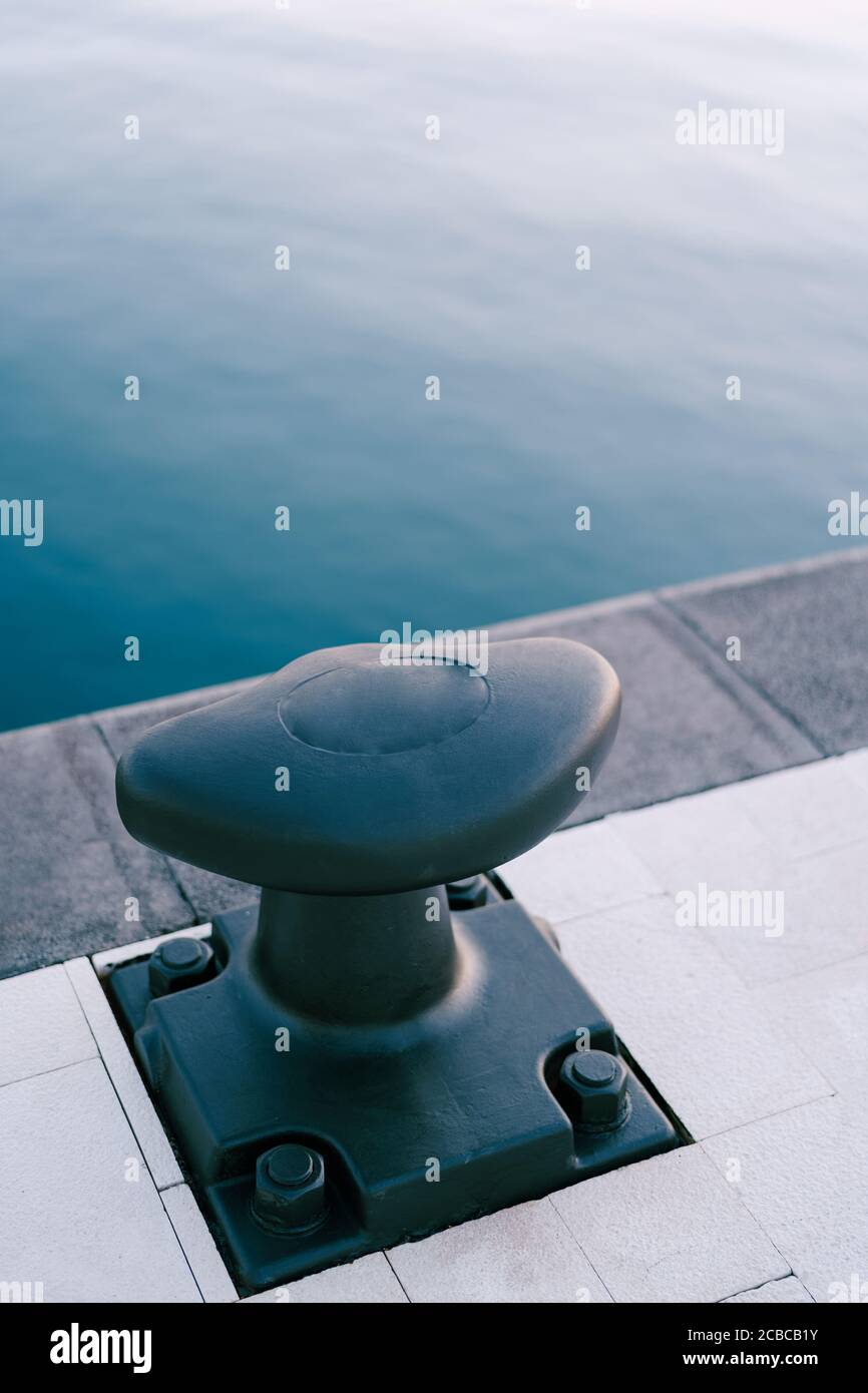 New modern maritime bollard in a yacht marina Stock Photo - Alamy