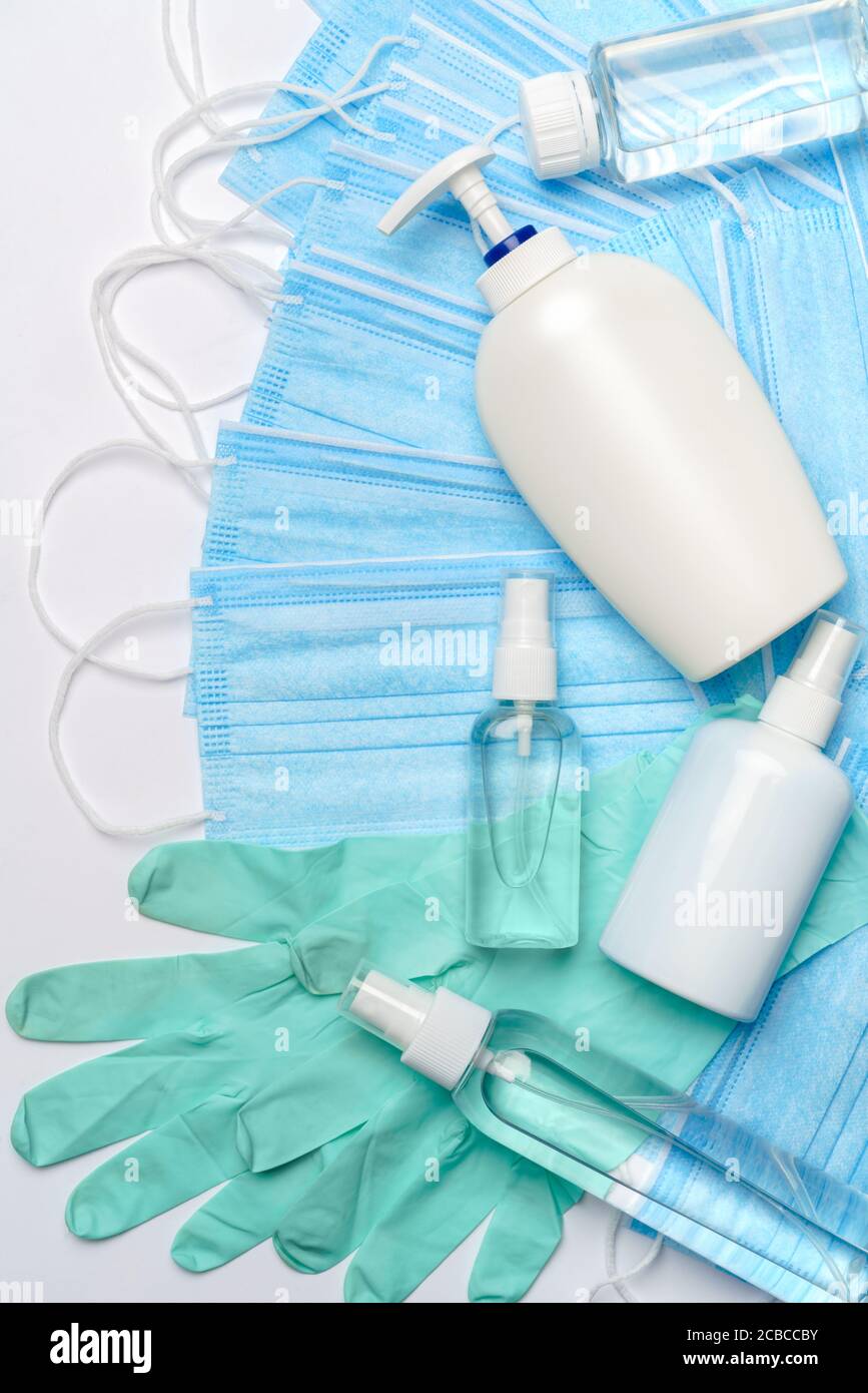 flat layout of hygiene items - latex gloves, mask and hand sanitizer or ...
