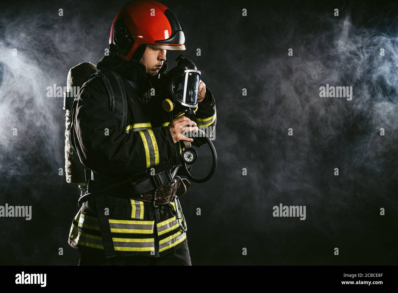 emergency situation. brave fireman came to protect and save from fire ...