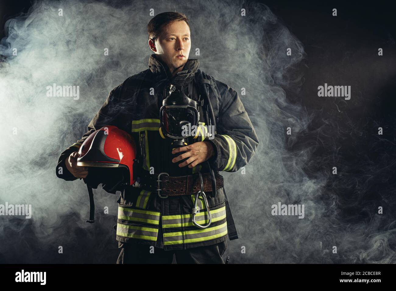 Man using fire extinguisher hi-res stock photography and images - Alamy