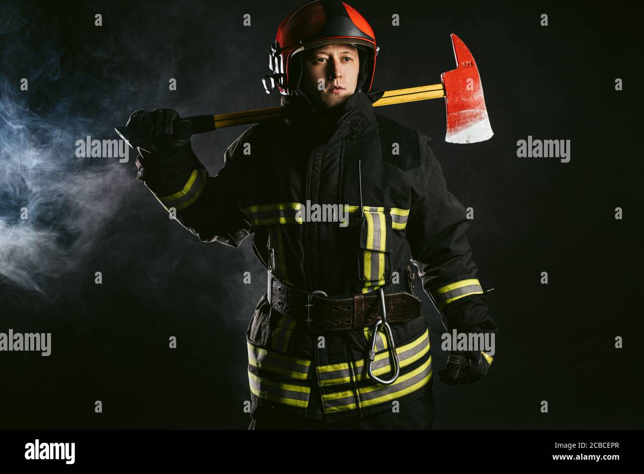 caucasian fireman hero, ready to protect all humanity from fire ...