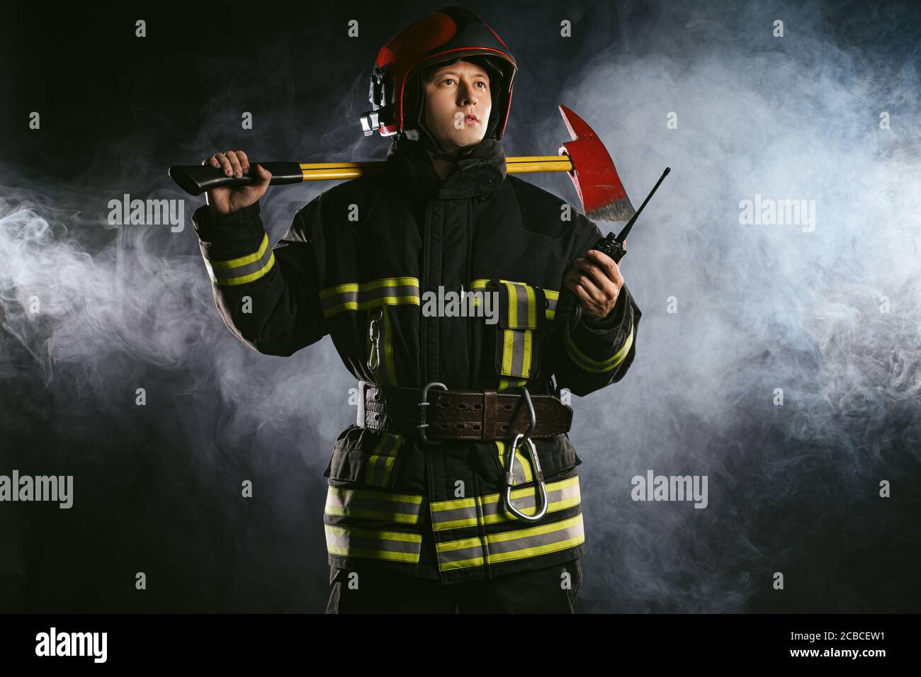 Man using fire extinguisher hi-res stock photography and images - Alamy