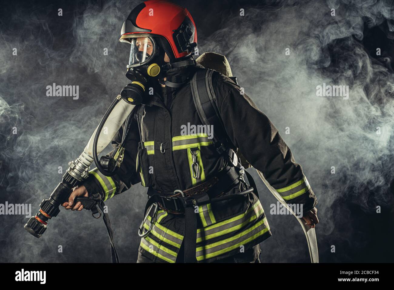 emergency situation. brave fireman came to protect and save from fire ...