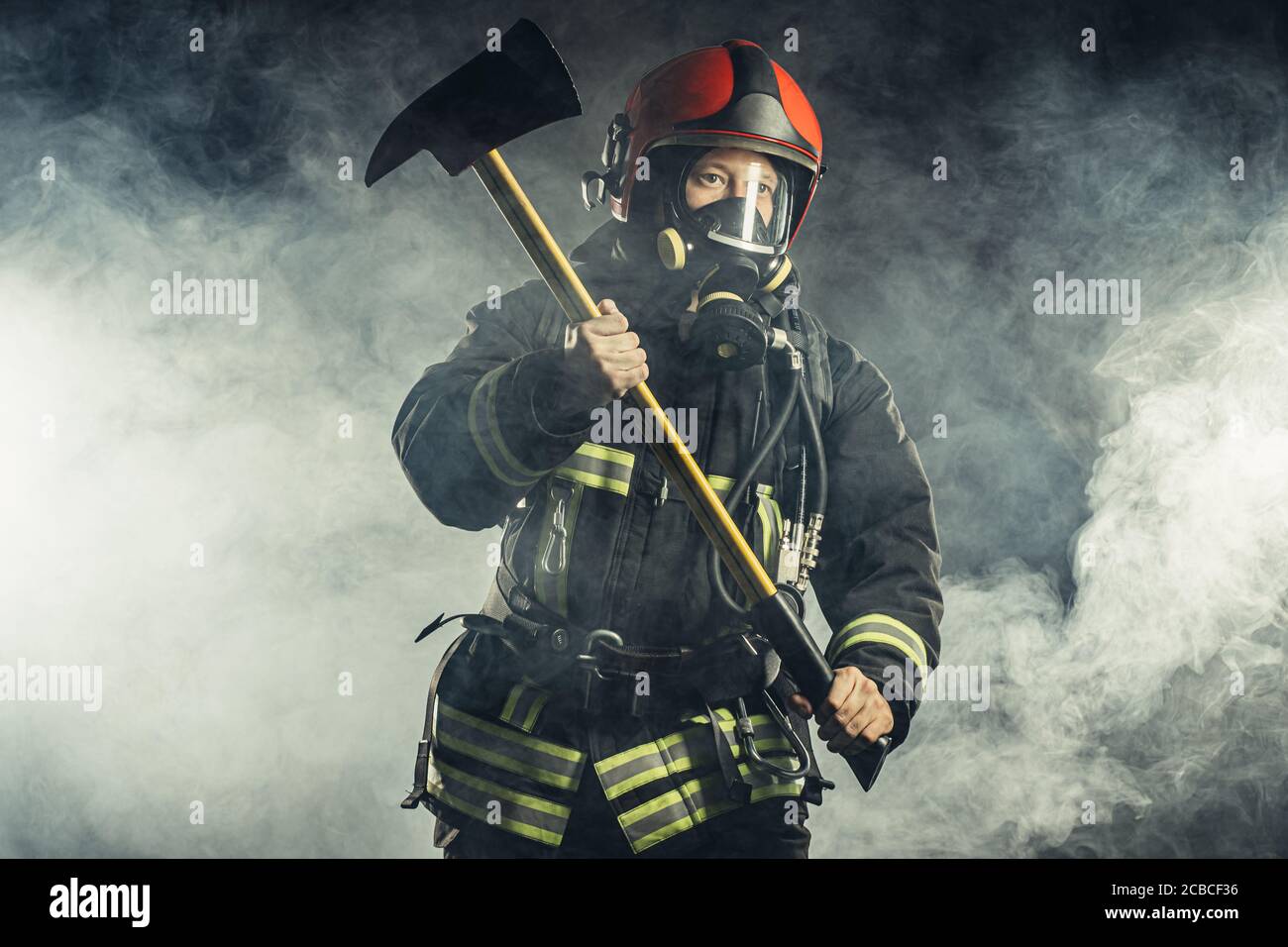 caucasian fireman hero, ready to protect all humanity from fire ...