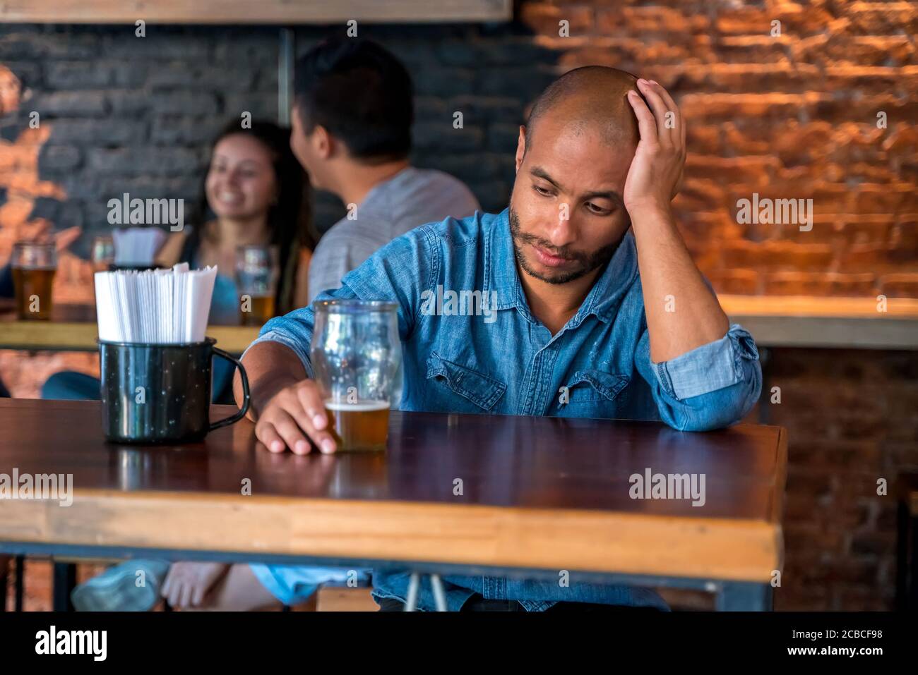Bar man beer sad hi-res stock photography and images - Alamy