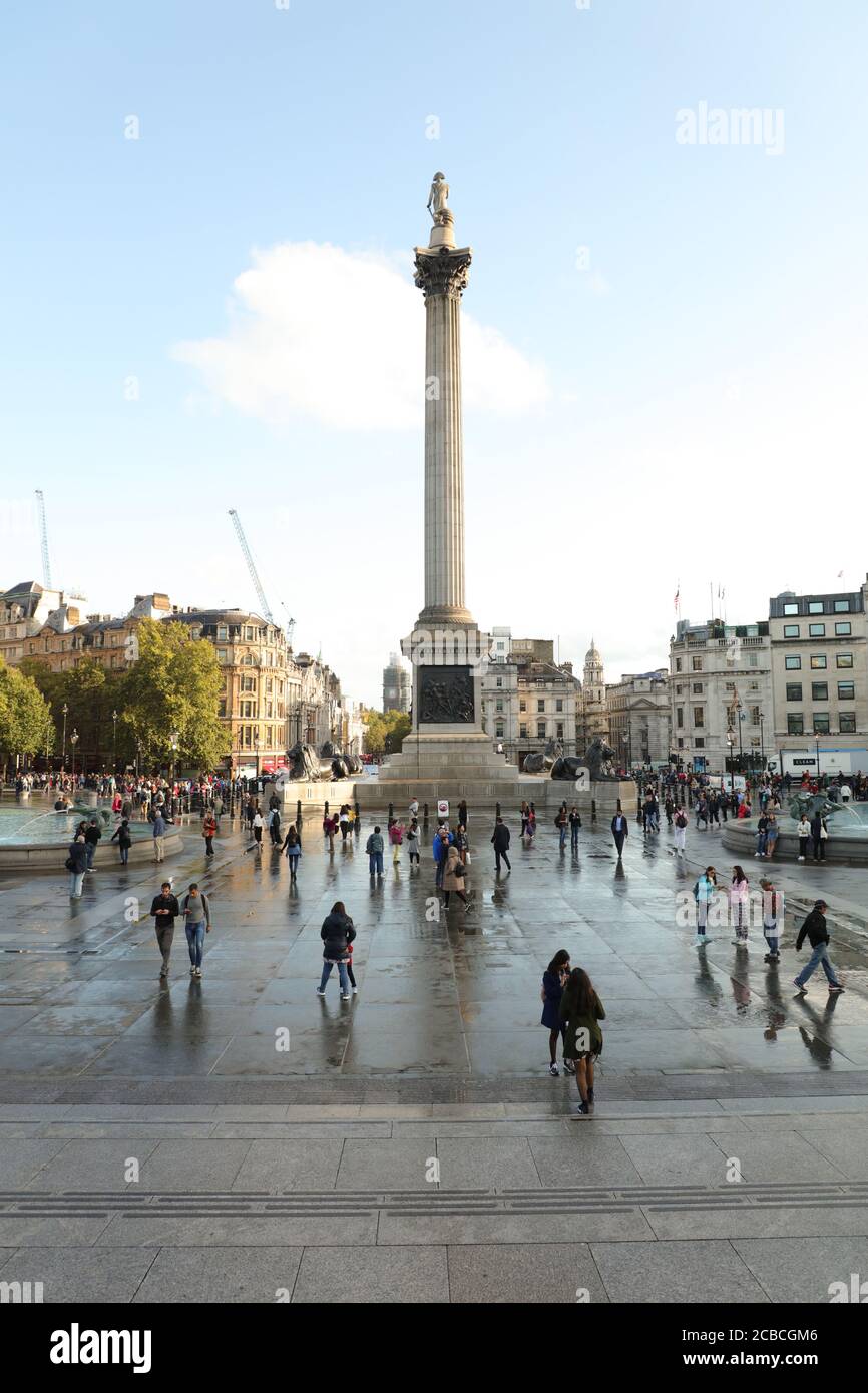 Trafalgar square london blue sky clouds people hi-res stock photography ...