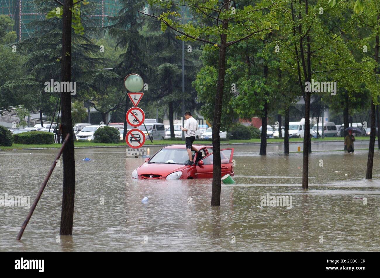 Chengdu, China. 11th Aug, 2020. The street was flooded by a heavy rain ...