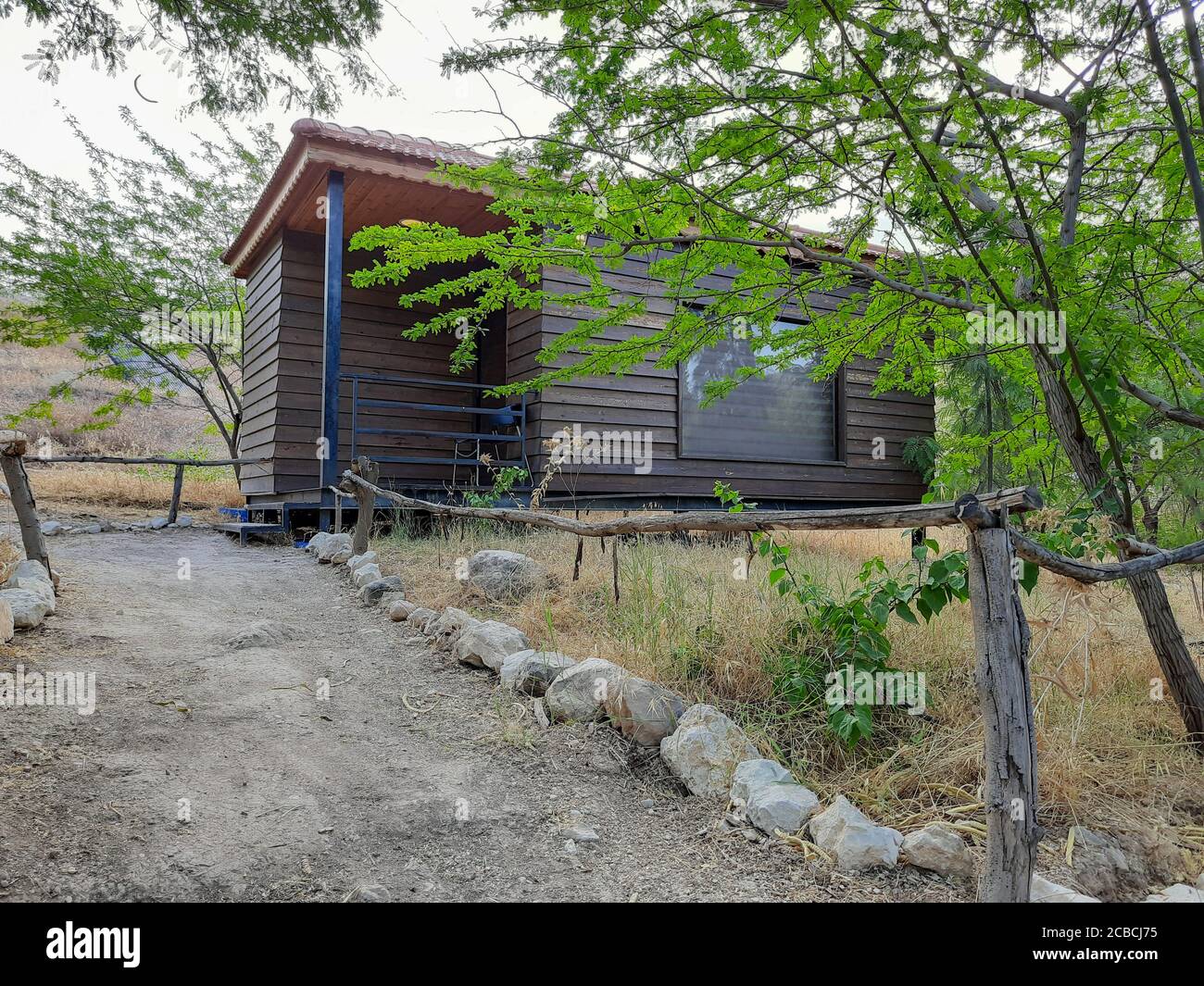 a beautiful wooden cabin between forests in Jordan Stock Photo - Alamy