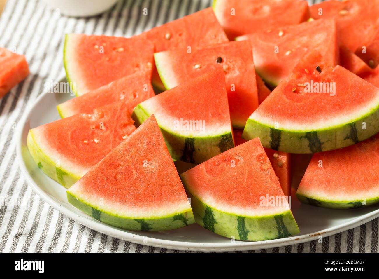 Raw Organic Green and Pink Watermelon Ready to Eat Stock Photo - Alamy