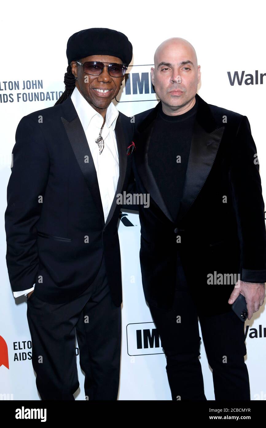 LOS ANGELES - FEB 9: Nile Rodgers, Merck Mercuriadis at the 28th Elton ...