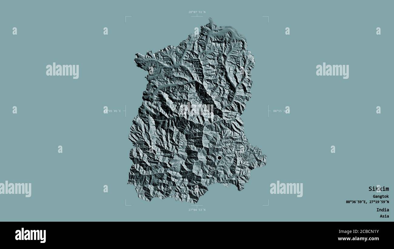 Area of Sikkim, state of India, isolated on a solid background in a georeferenced bounding box ...