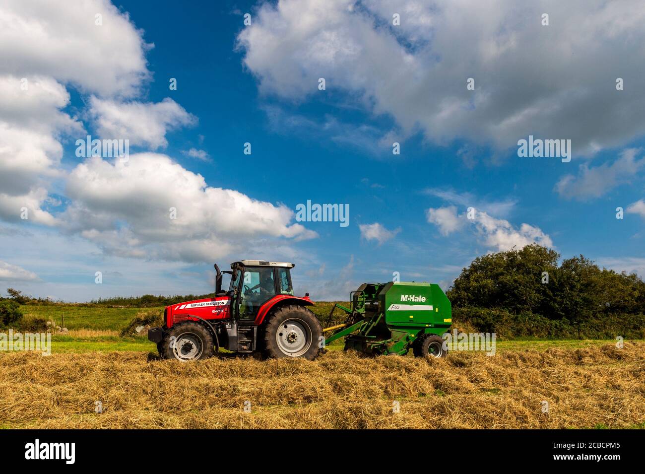 Drinagh, West Cork, Ireland. 12th Aug, 2020. Evan Wilson bales hay on ...