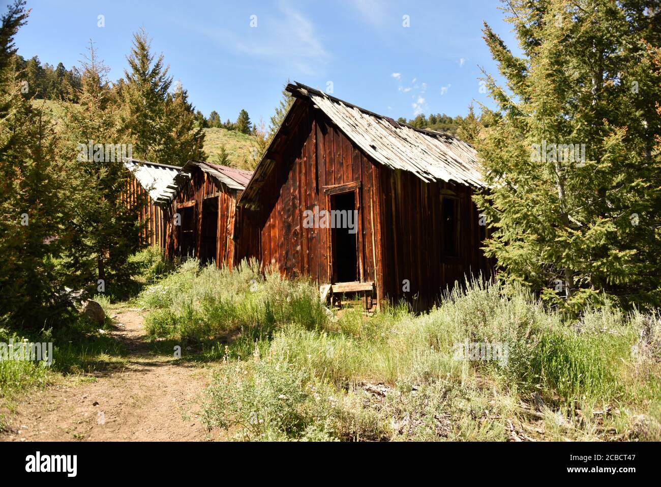 Abandoned mining cabins in old ghost town in Idaho mountains Stock ...