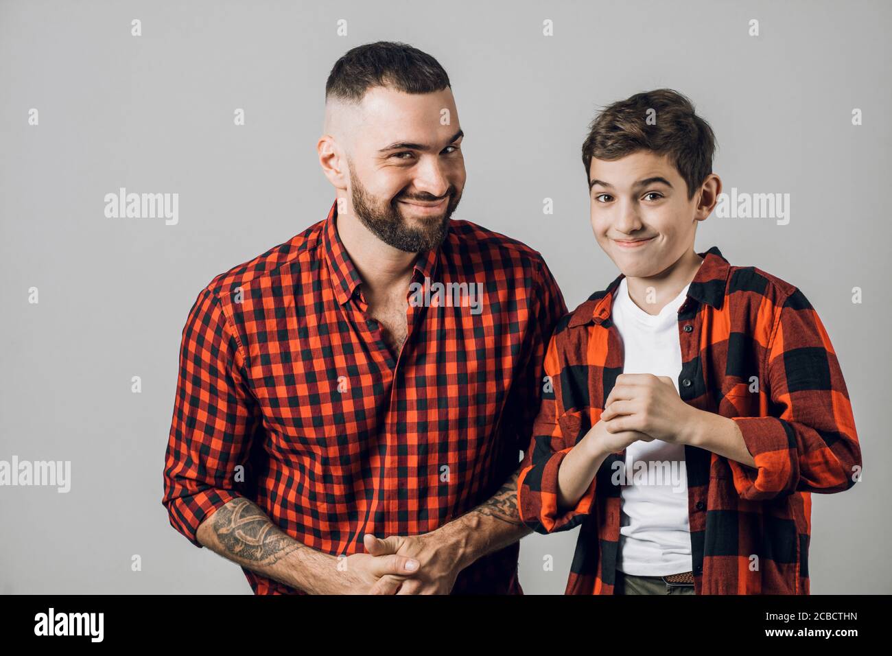 dad and a kid with a cunning plan. secret information. father and son ...
