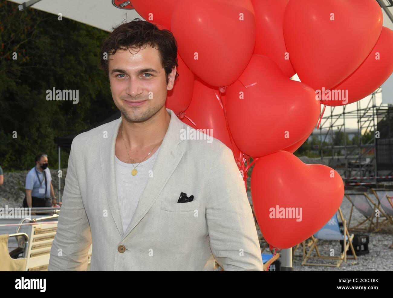Munich, Germany. 12th Aug, 2020. The actor Samuel Schneider shows up at ...
