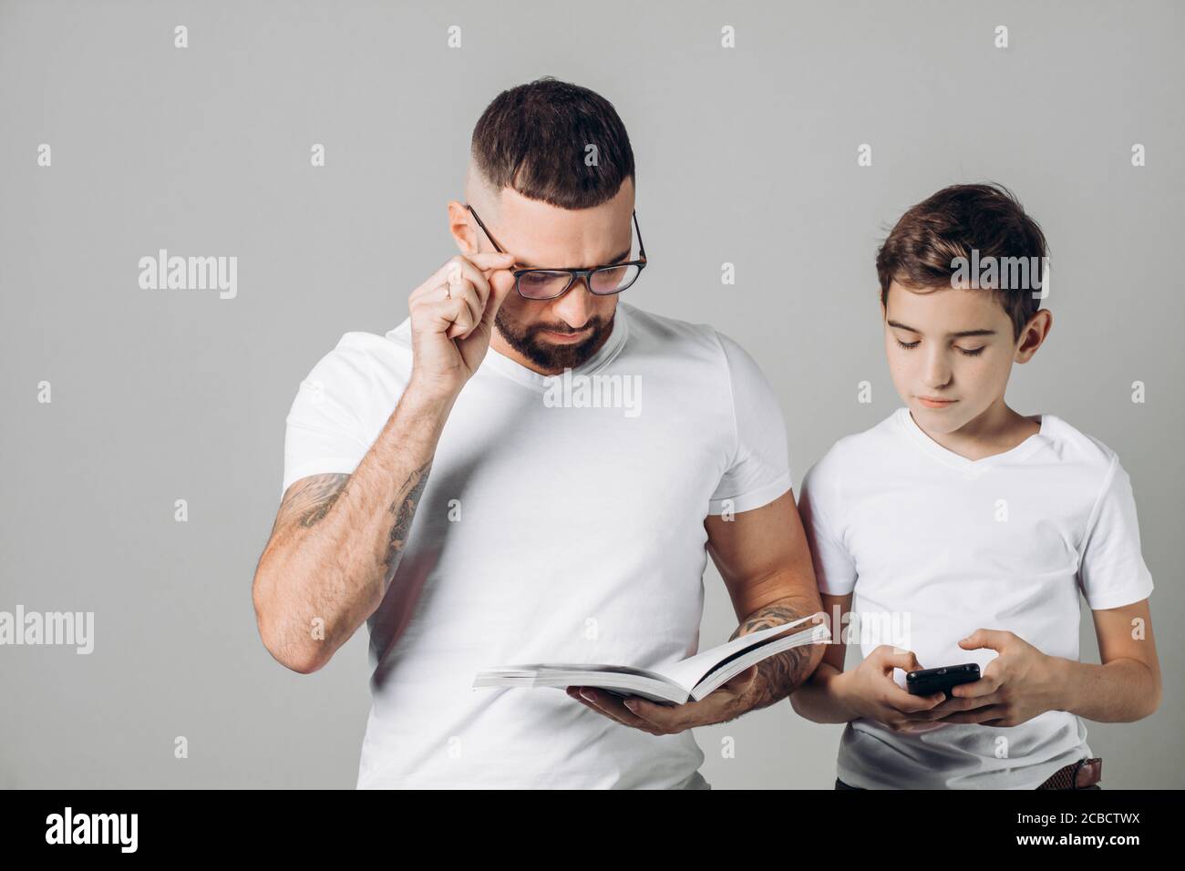 old and young generation . different interests. close up portrait. copy ...