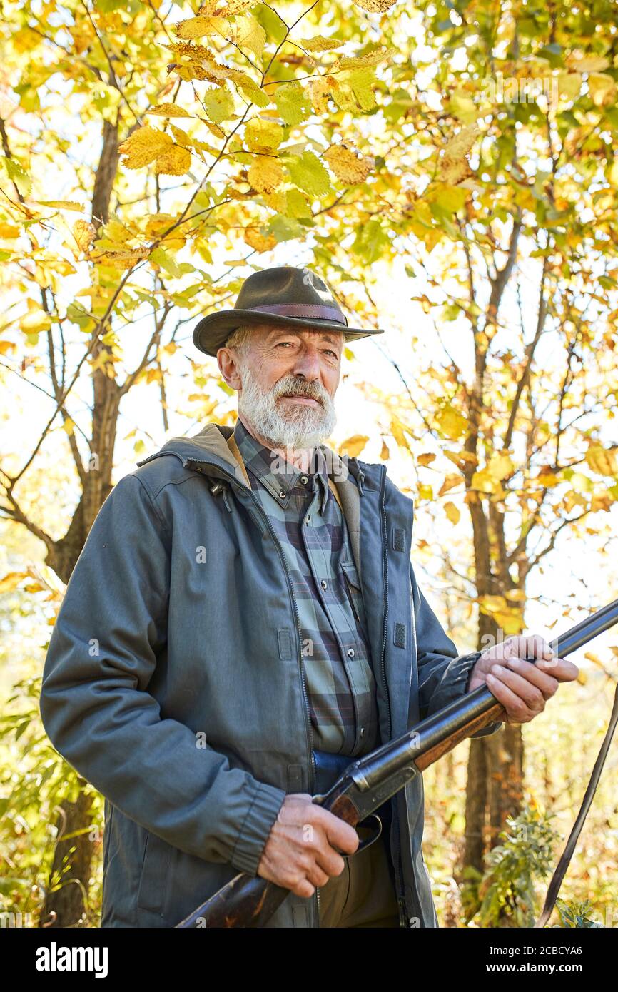 Portrait of older hunter after successful hunt, an experienced hunter ...