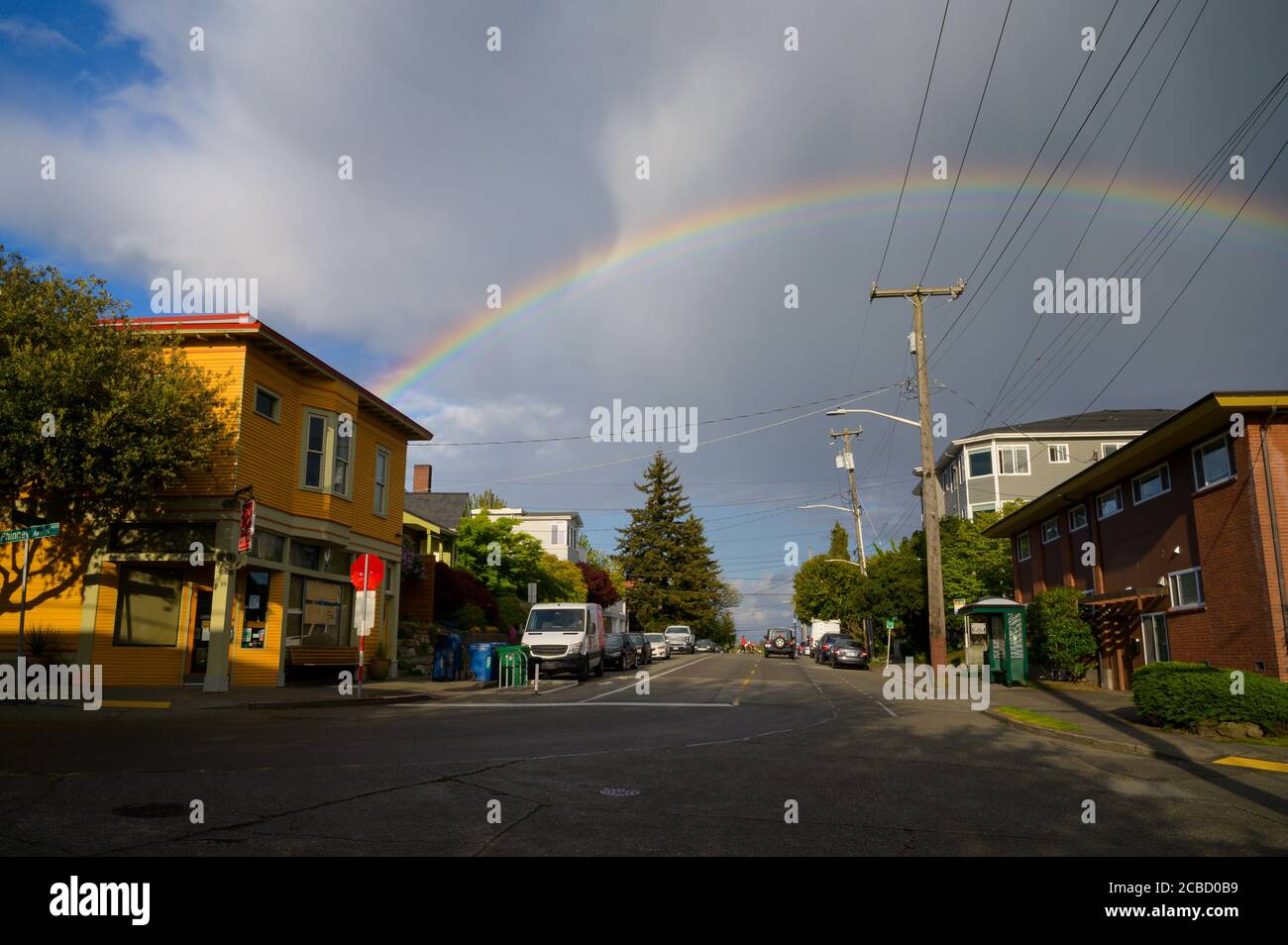 Rainbow over buildings hi-res stock photography and images - Alamy