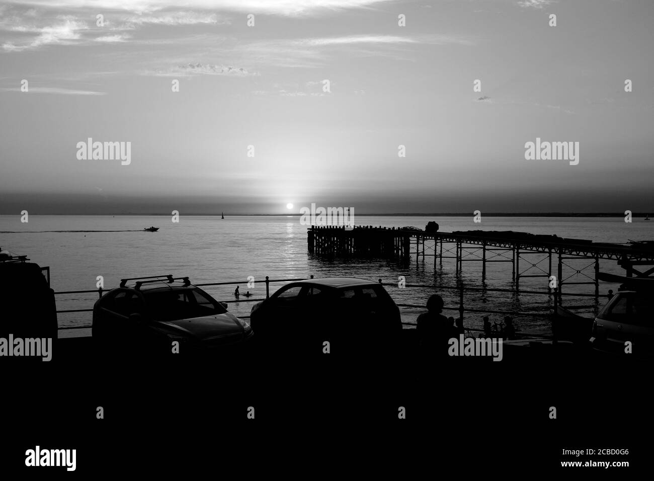 Beachgoers sunset Black and White Stock Photos & Images - Alamy