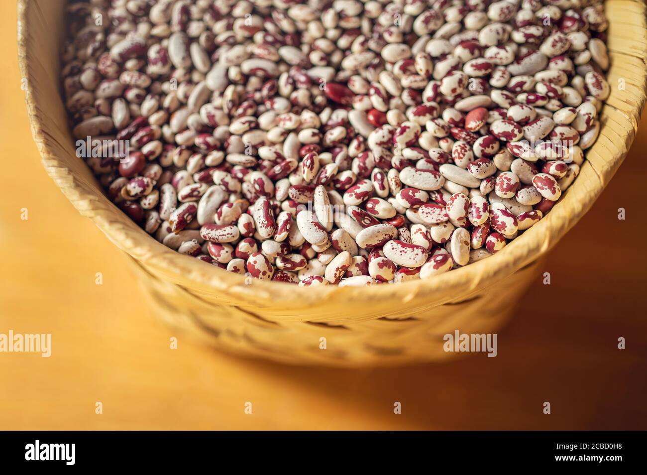 Exotic colorful mexican beans on wicker basket. Top view of legumes ...