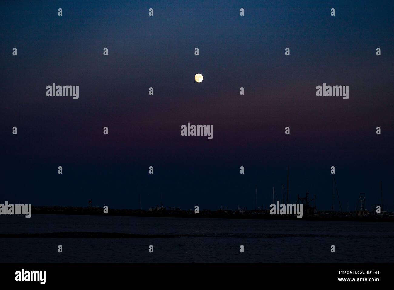 Faint moon in the sky hi-res stock photography and images - Alamy
