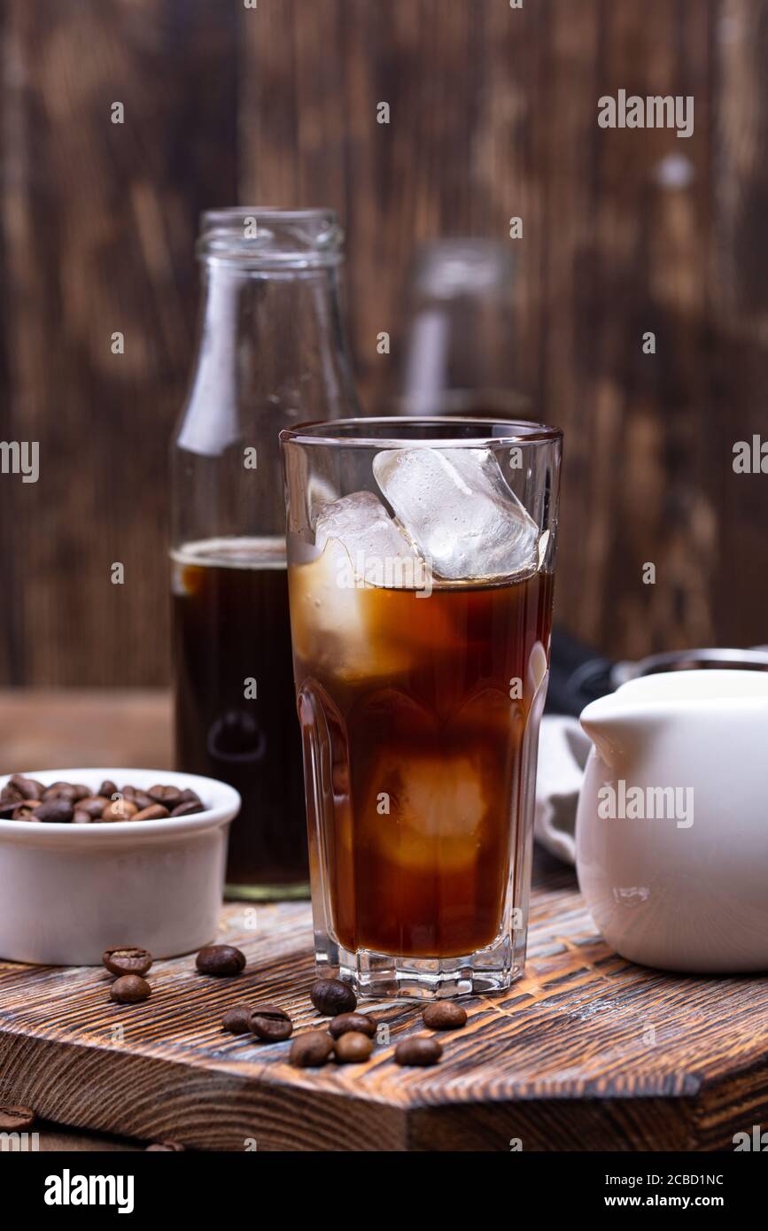 Cold brew coffee with ice and milk Stock Photo - Alamy