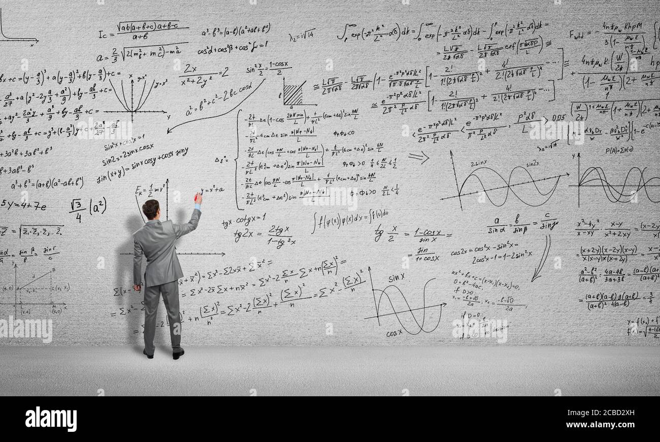 Man draw science formulas Stock Photo - Alamy