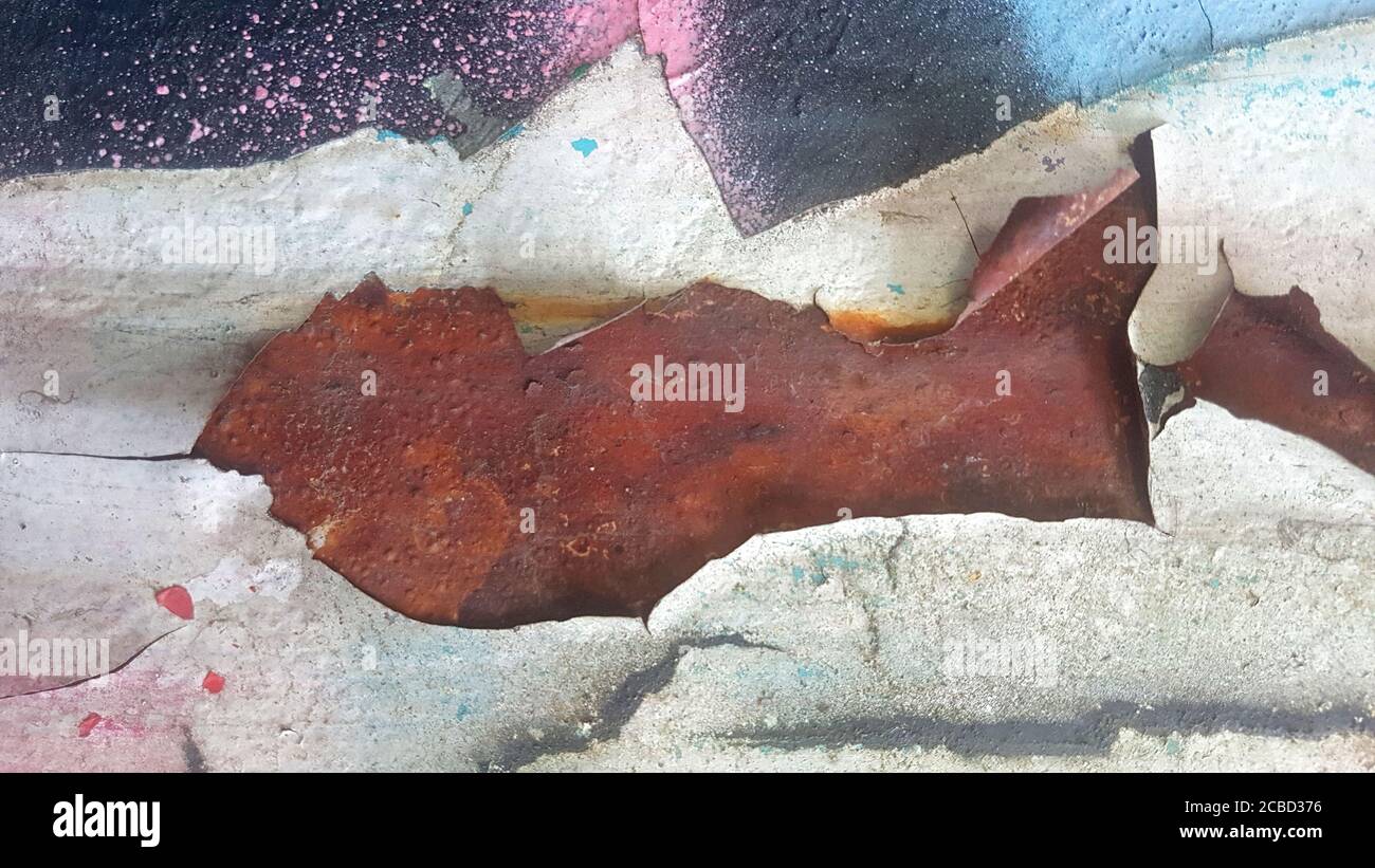Old weathered paint that separated from rusty metal and peels off Stock ...