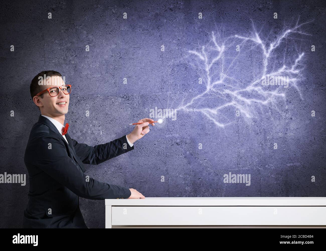 Smart guy draw on wall Stock Photo - Alamy