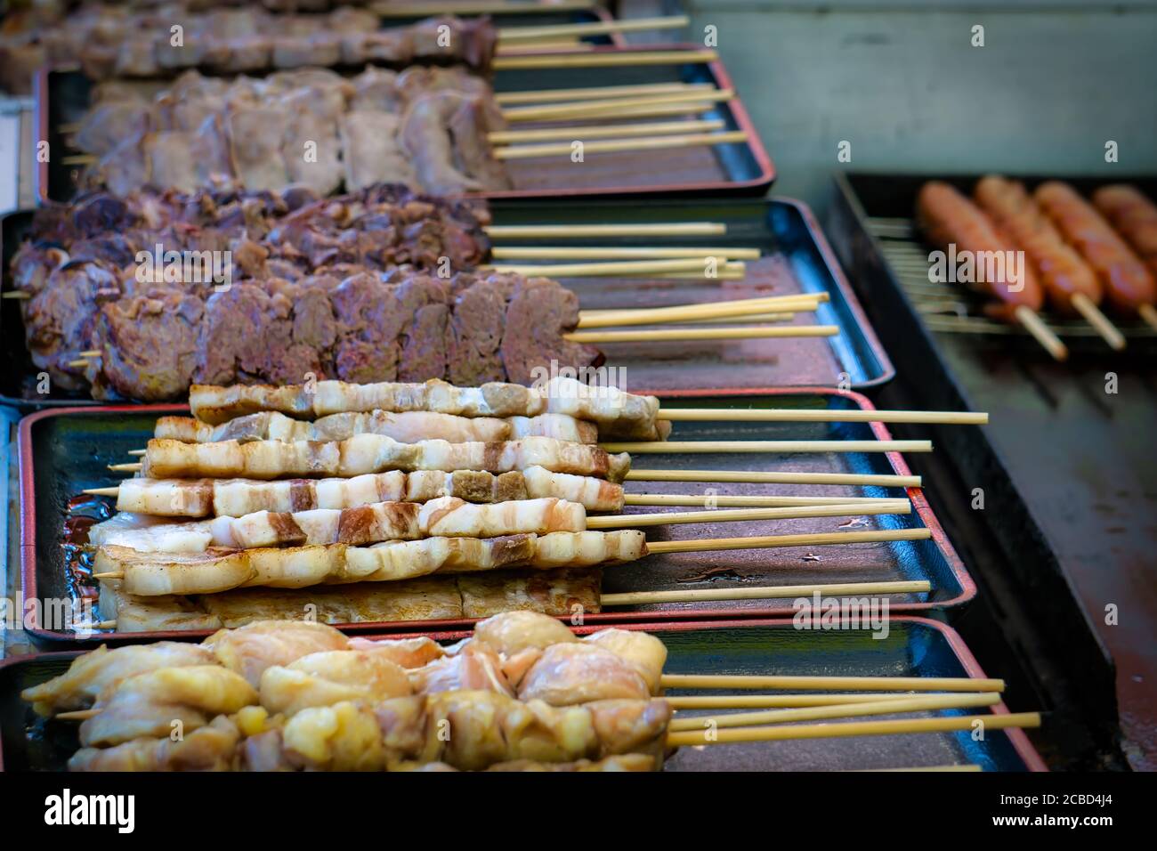 A local delicacy sits on a grill at a festival in Shimoda, Japan Stock ...