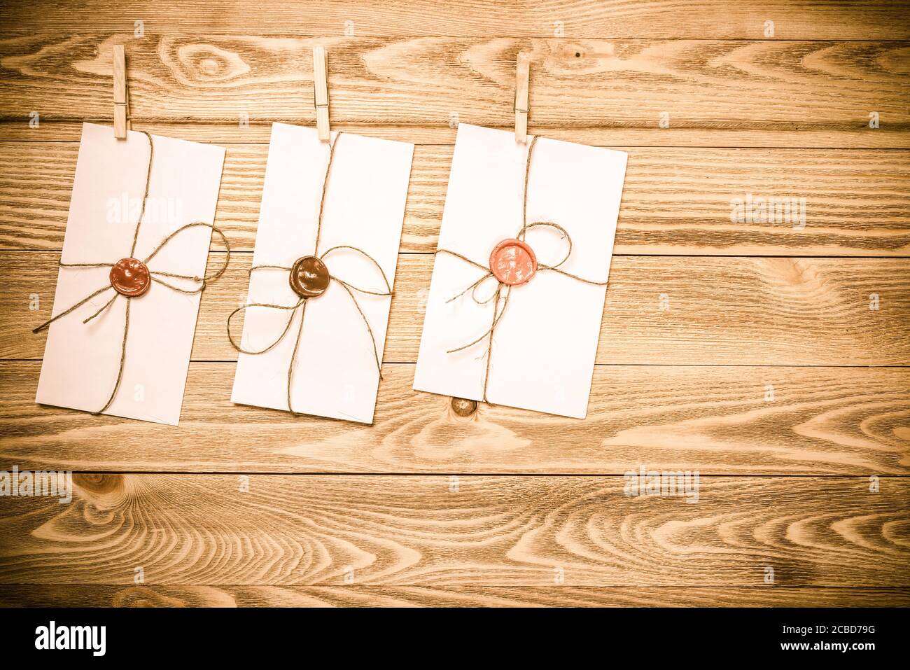 Mail envelope on rope Stock Photo - Alamy