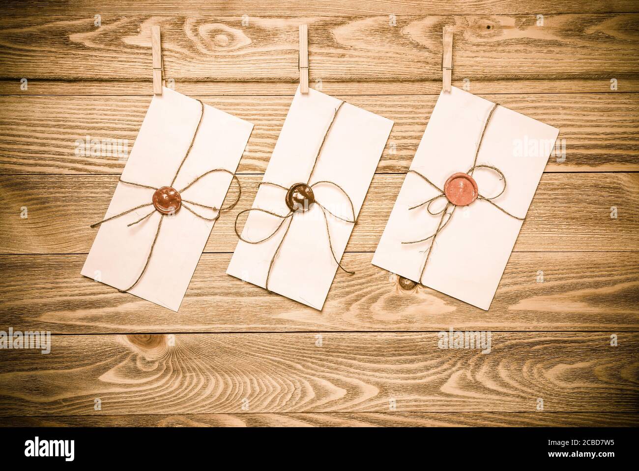 Mail envelope on rope Stock Photo - Alamy