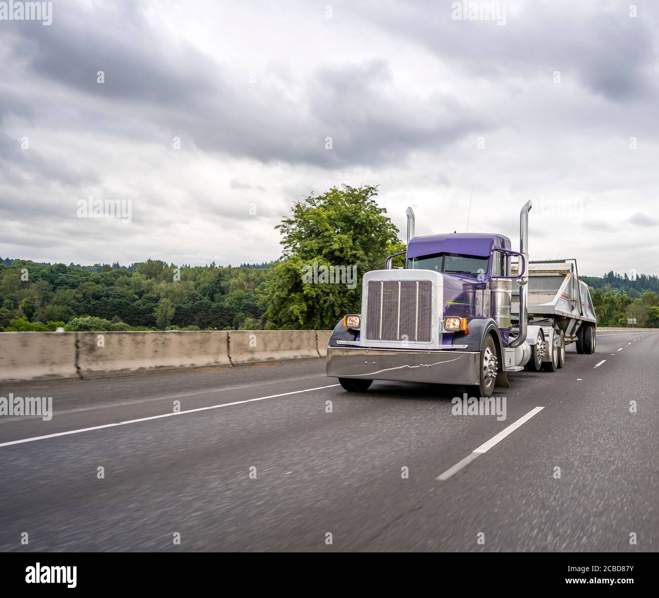 Big rig purple shiny industrial diesel day cab powerful semi truck ...