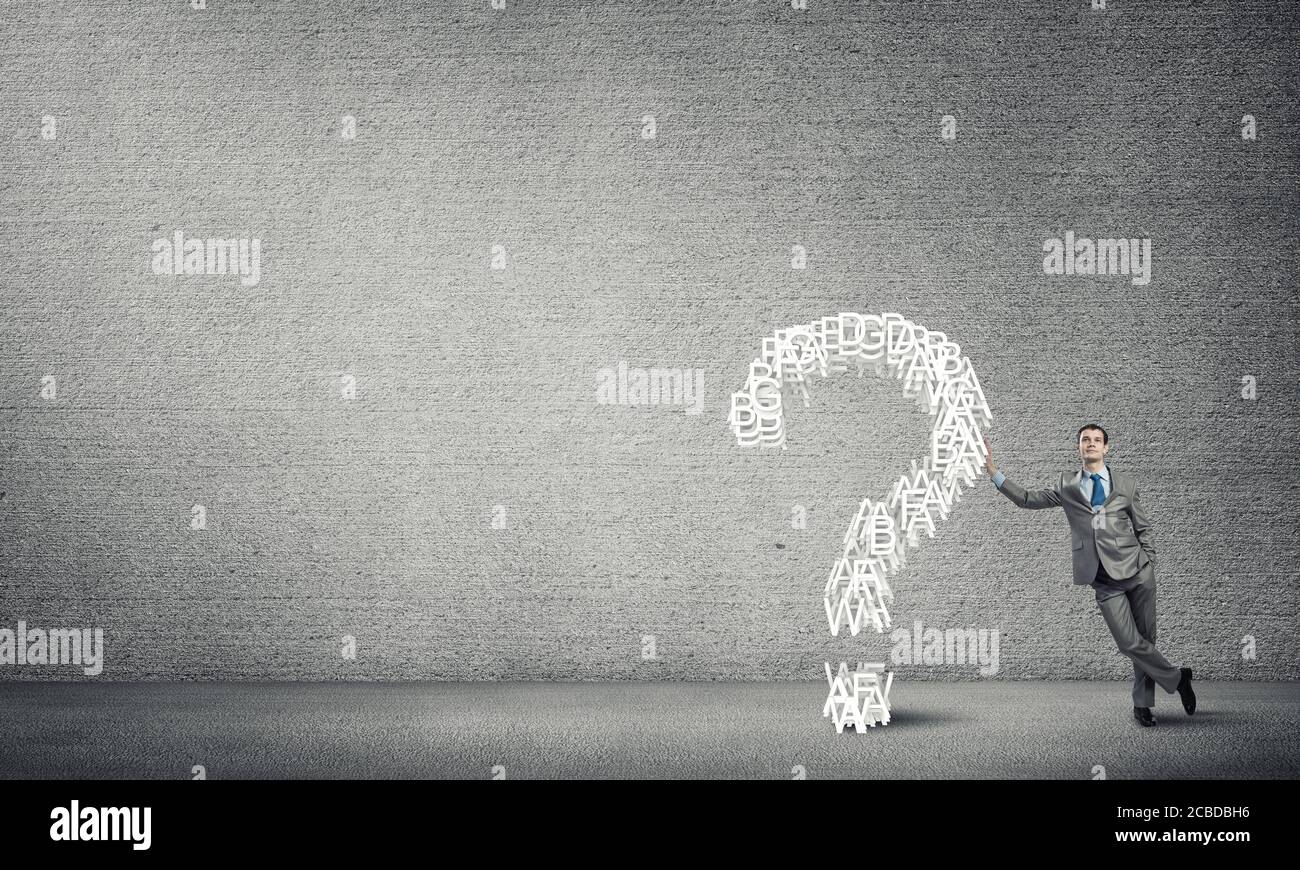Man and big question mark Stock Photo - Alamy