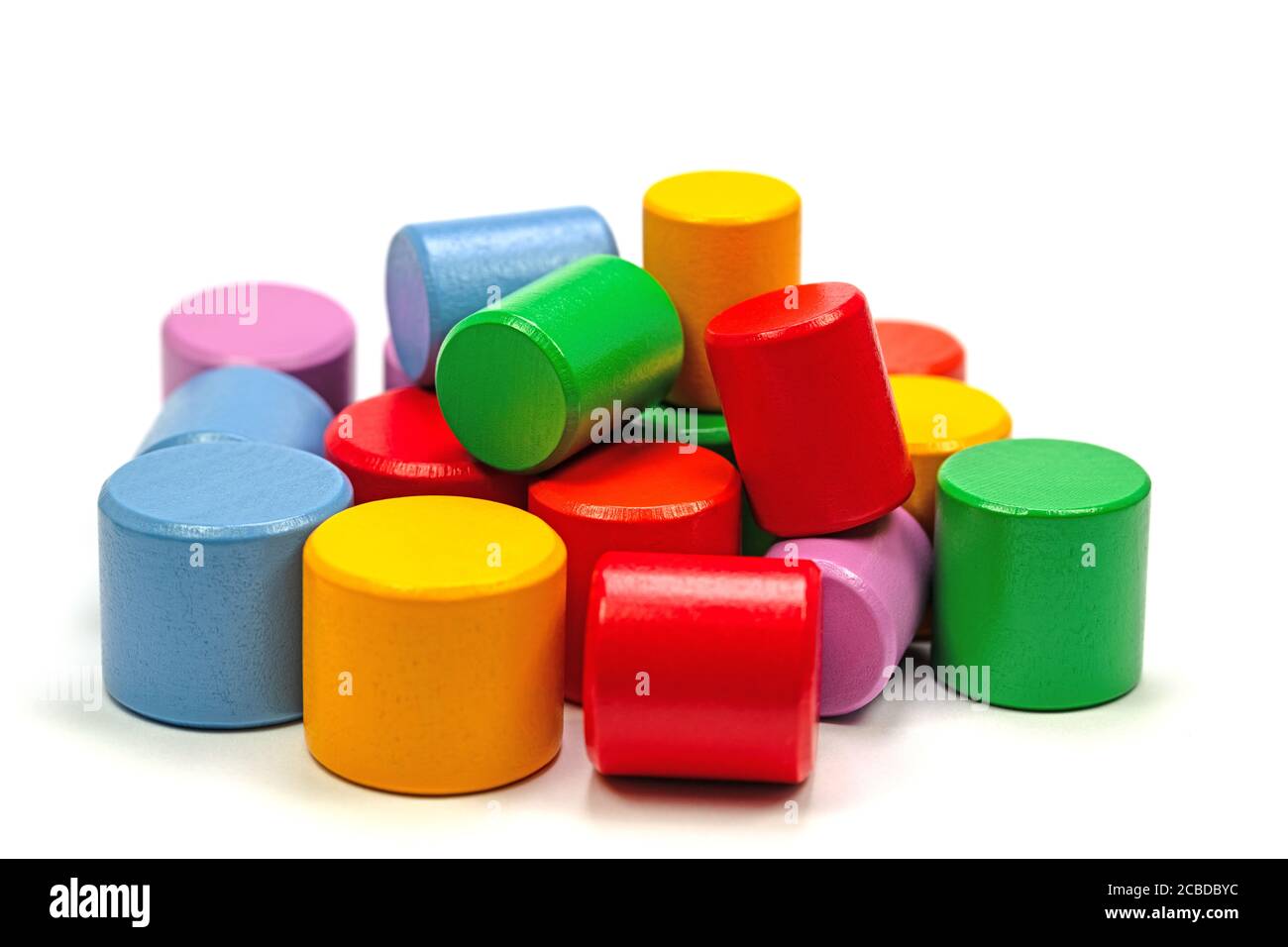 Colorful wooden blocks against a white background Stock Photo - Alamy