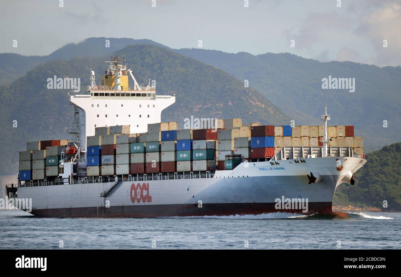 A OOCL container ship crossing the East Lamma Channel in Hong Kong ...