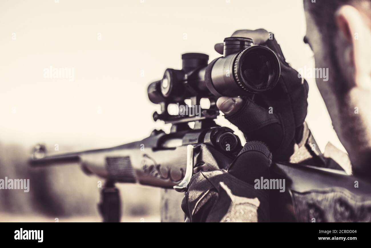 Hunter man. Hunting period. Close up. Hunter with hunting gun and ...