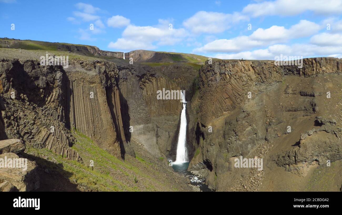 Distant shot of the Litlanesfoss waterfall in East Iceland Stock Photo ...