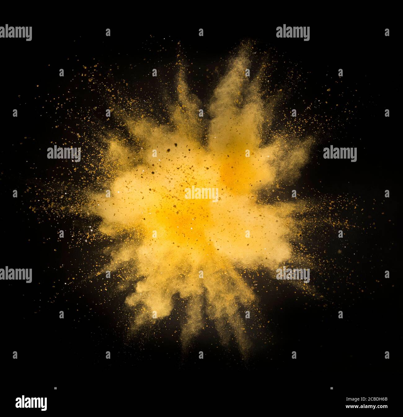 Explosion of colored powder isolated on black background. Abstract ...