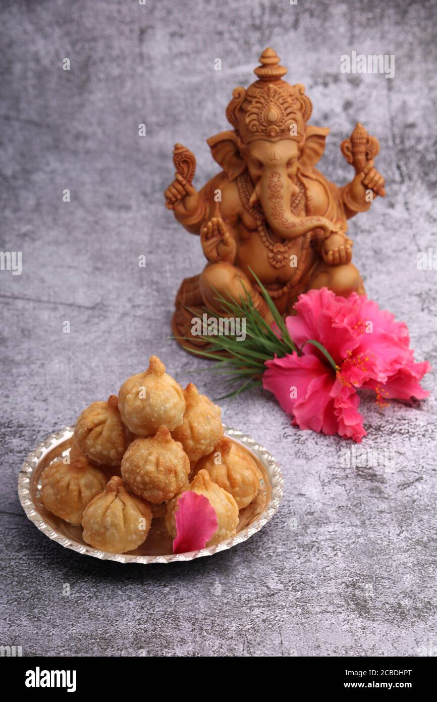 Ganesh Puja - Sweet Modak food offered on Ganpati festival or Chaturthi ...