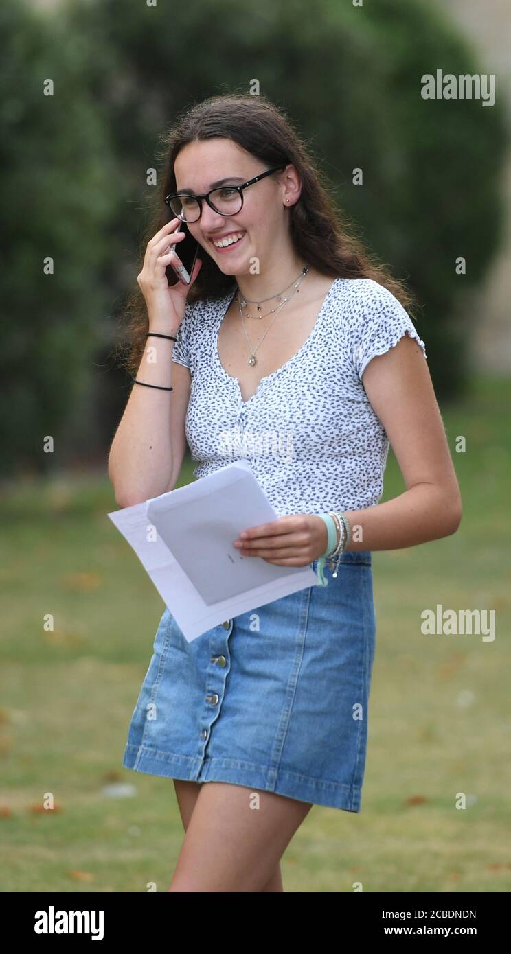 Emily Wallace reacts as students at Norwich School, Norwich, receive ...