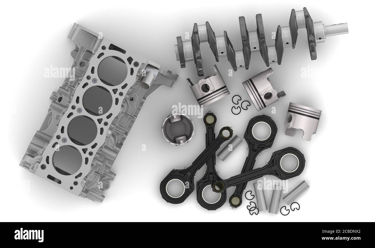 Engine parts lie on a white surface. Details of the internal combustion ...