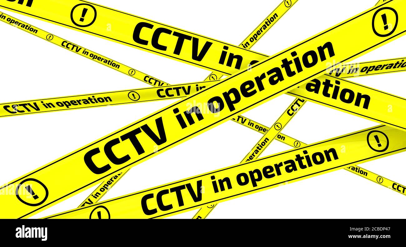 CCTV in operation. Yellow warning tapes with black text - CCTV in ...