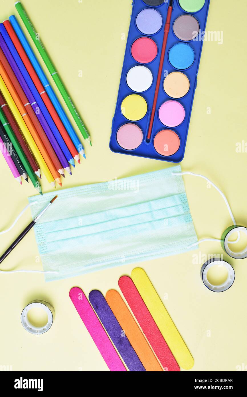 Colorful flat lay background with craft supplies on the way back to ...