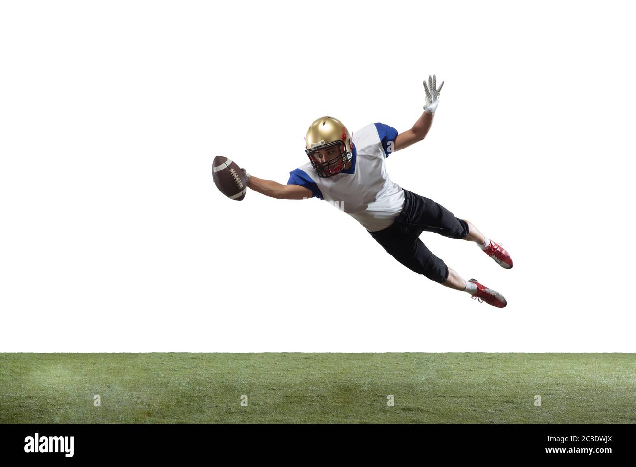 In jump, flight. American football player isolated on white studio ...