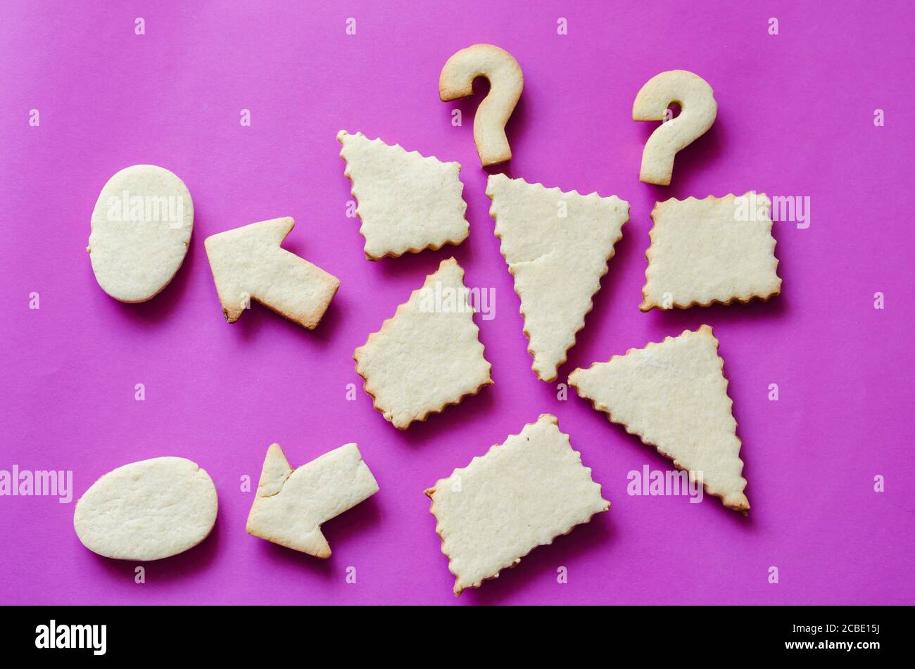 Creative background Homemade shortbread cookies. Arrow symbol, question ...