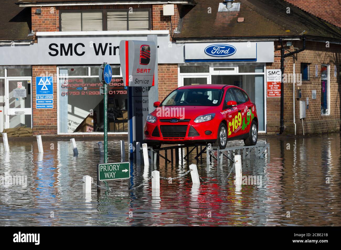 Flooded car show room Slough road in the village of Datchet, Berkshire ...