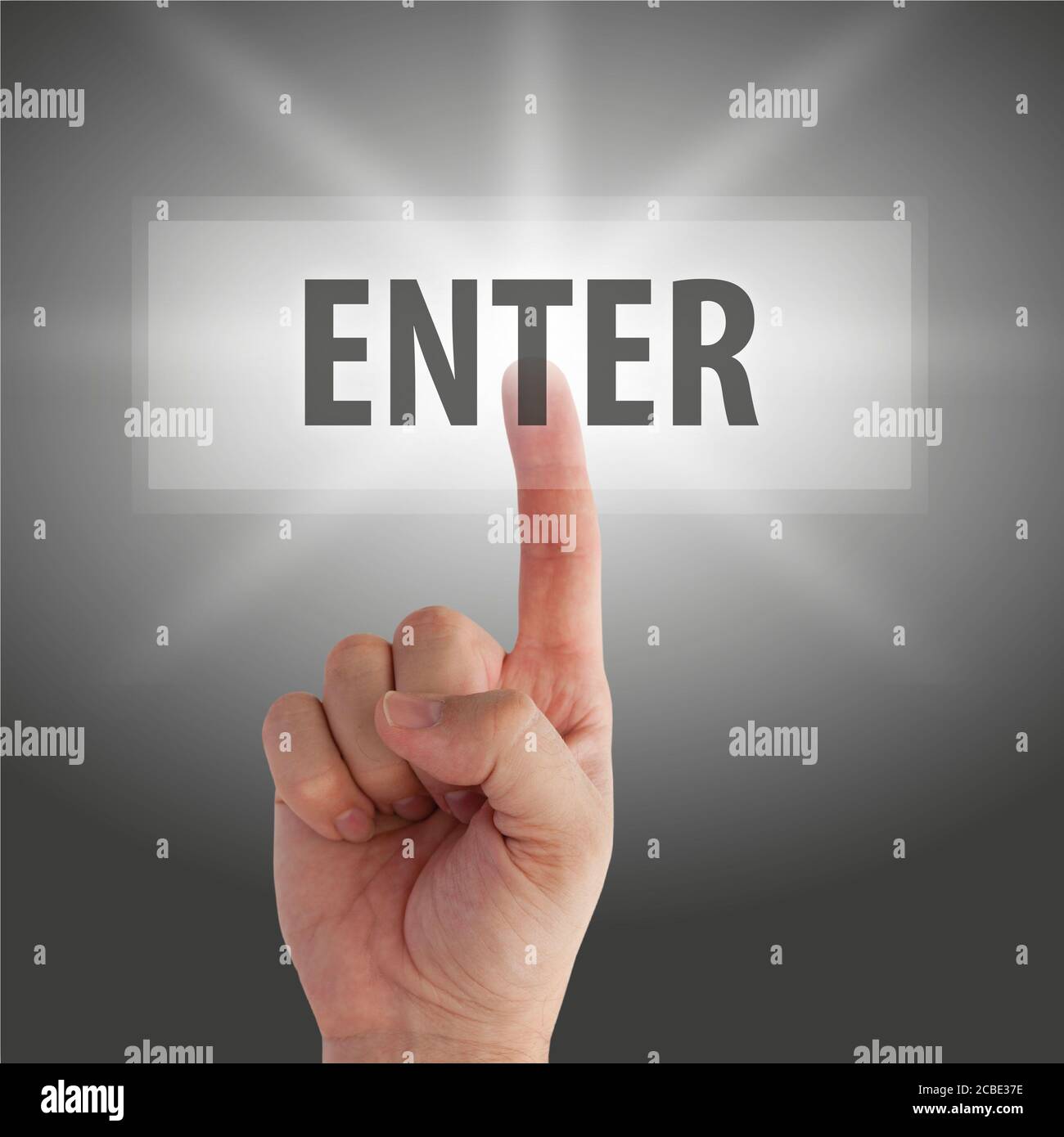 Person's forefinger pushing an enter button on a gray background Stock ...
