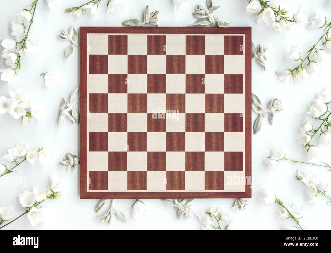 Empty chess board, styled image flat lay, top view, end of the game ...